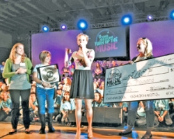 LAEF receives $7,000 from Young Americans | Sun Newspapers